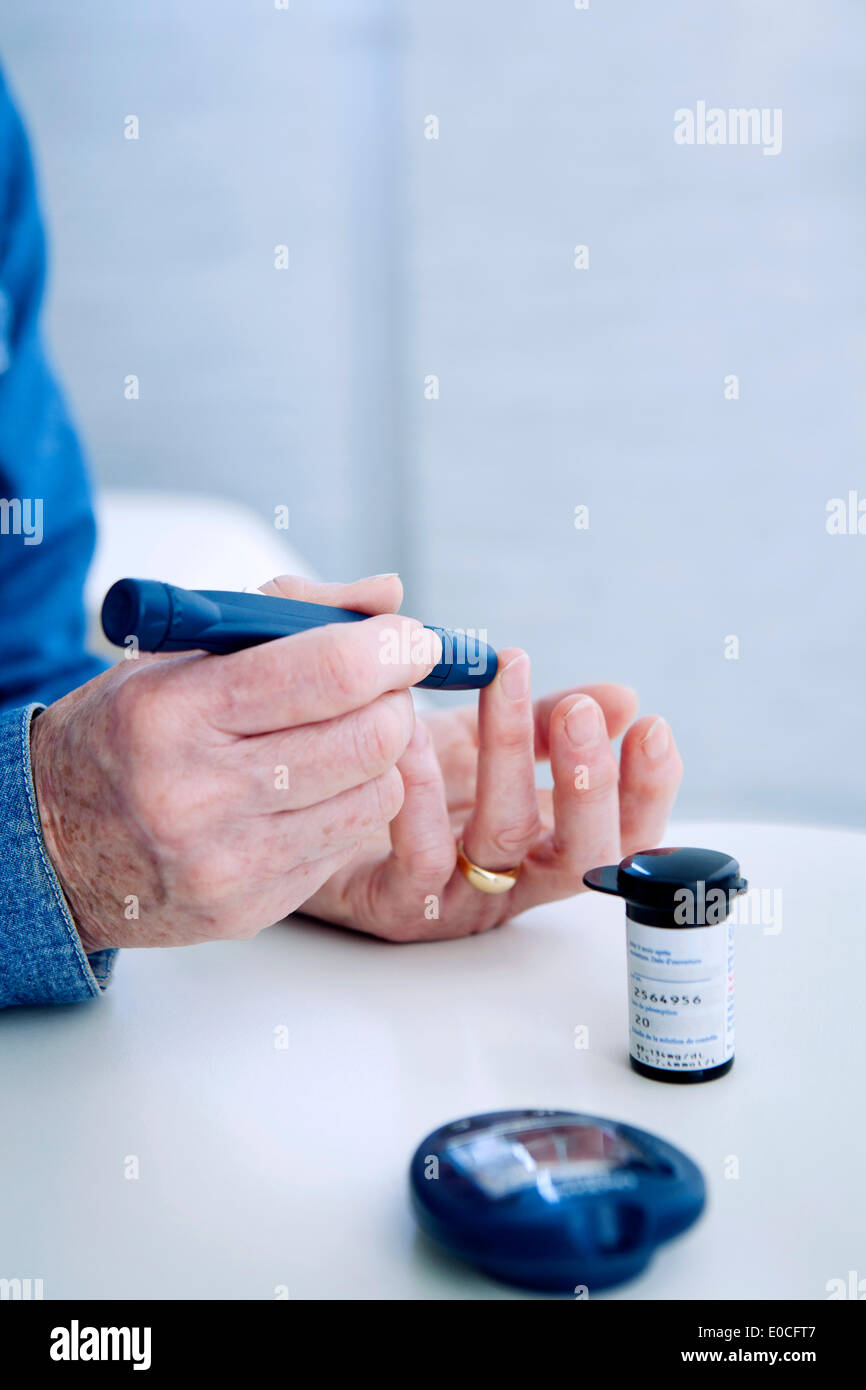 Test for diabetes, elderly person Stock Photo - Alamy