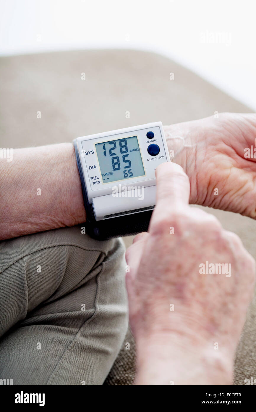 Blood pressure, elderly person Stock Photo - Alamy