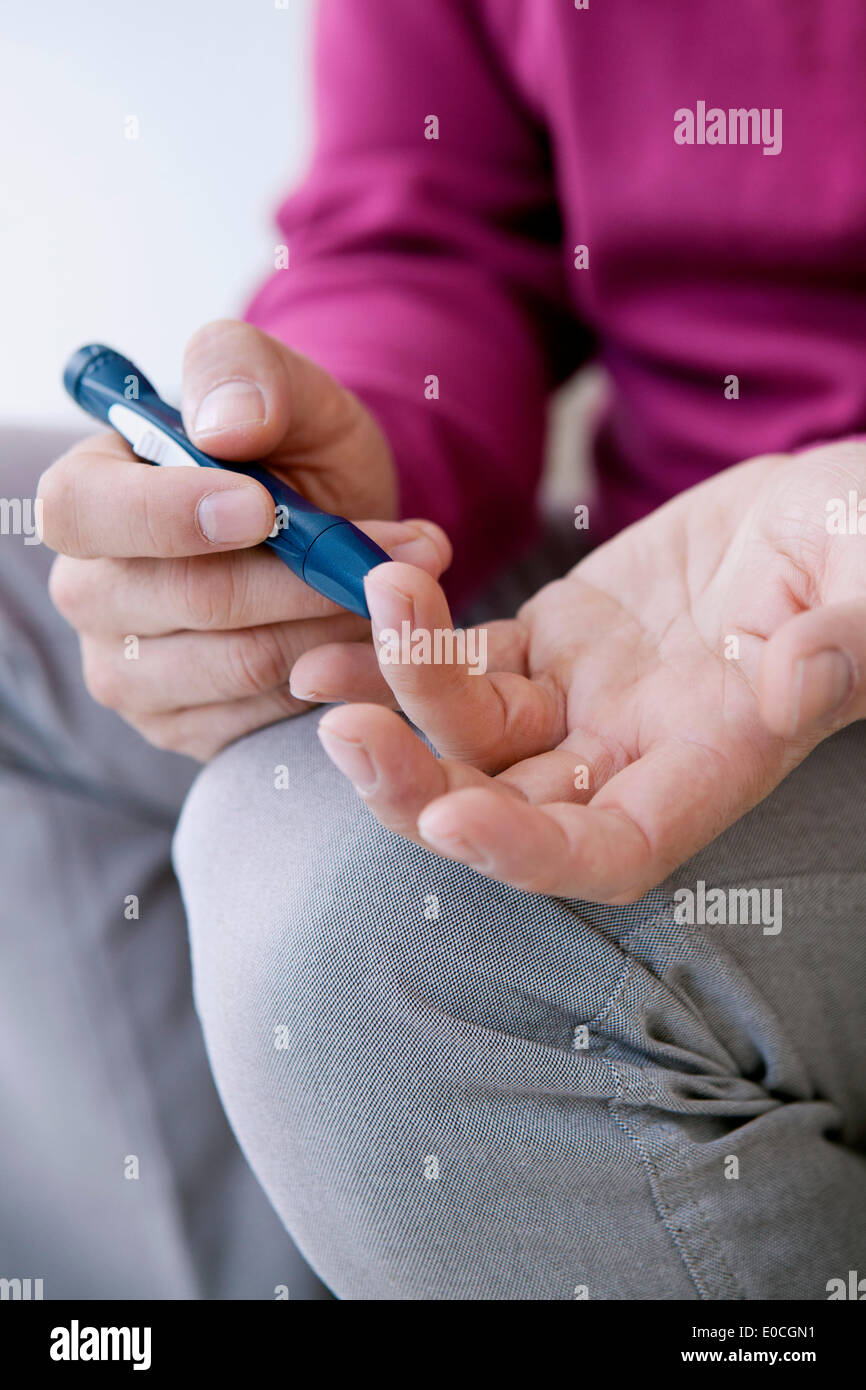 Test for diabetes, man Stock Photo - Alamy