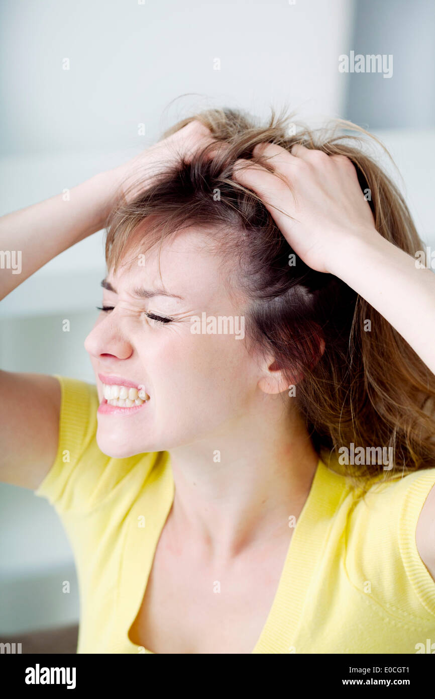 Woman itching head hi-res stock photography and images - Alamy
