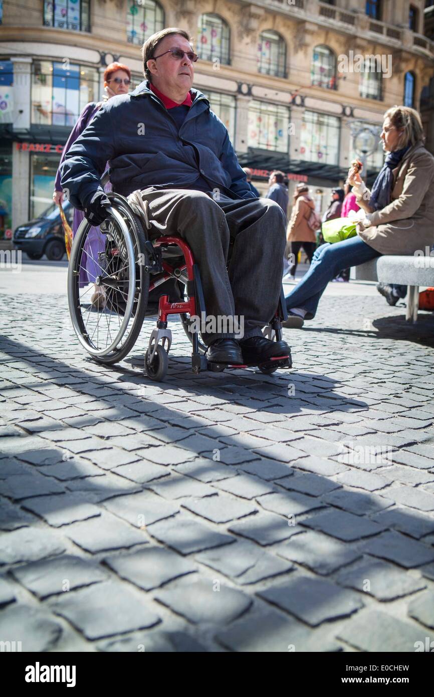 Disabled man men wheelchair handicap hi-res stock photography and ...