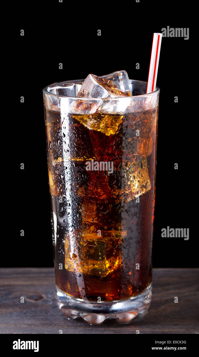 Glass of cola with ice Stock Photo - Alamy