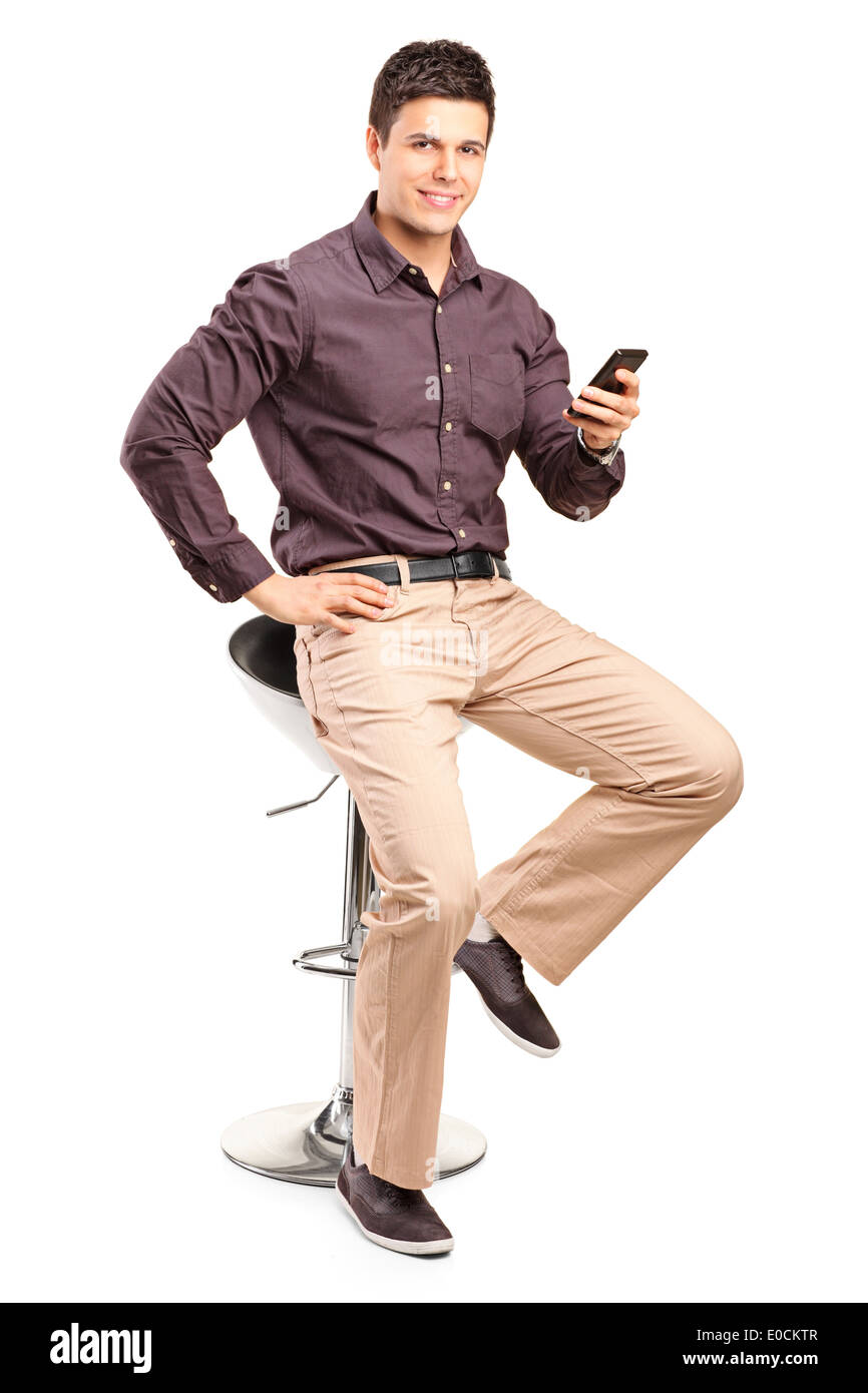 Man sitting looking cell Cut Out Stock Images & Pictures - Alamy