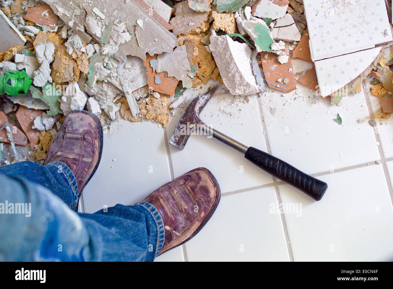 Broken tiles with the renovation of a bathroom. Rebuilding and renewal ...