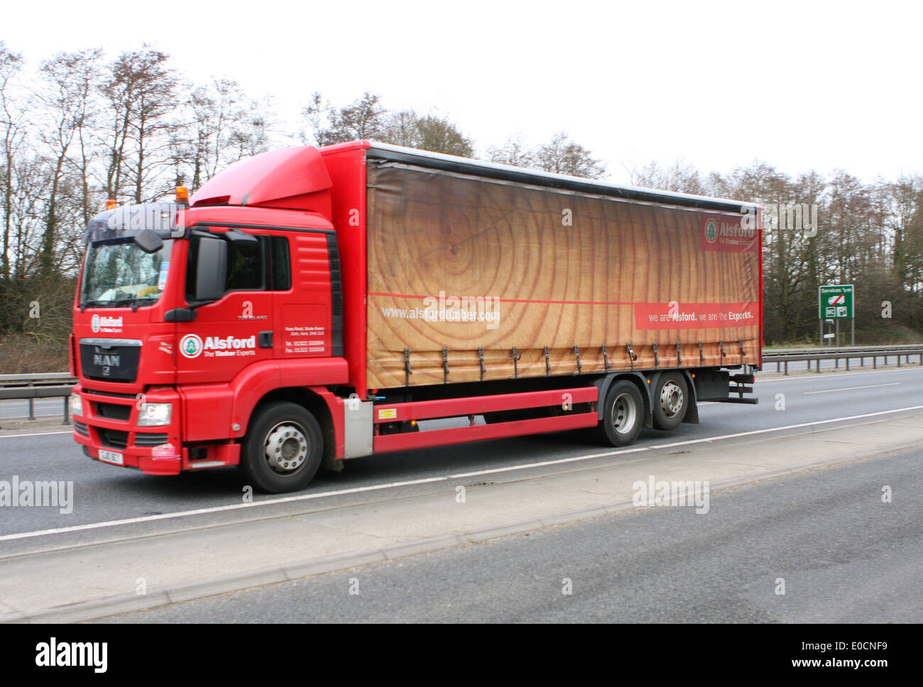 Timber lorry driving highway hi-res stock photography and images - Alamy