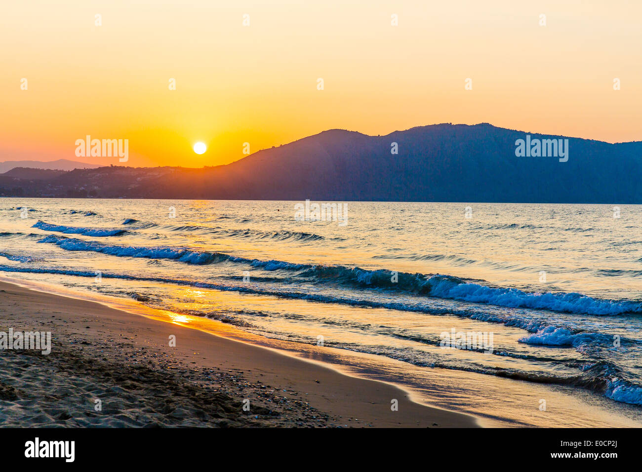 Beach on sunset in village Kavros in Crete island, Greece. Magical ...