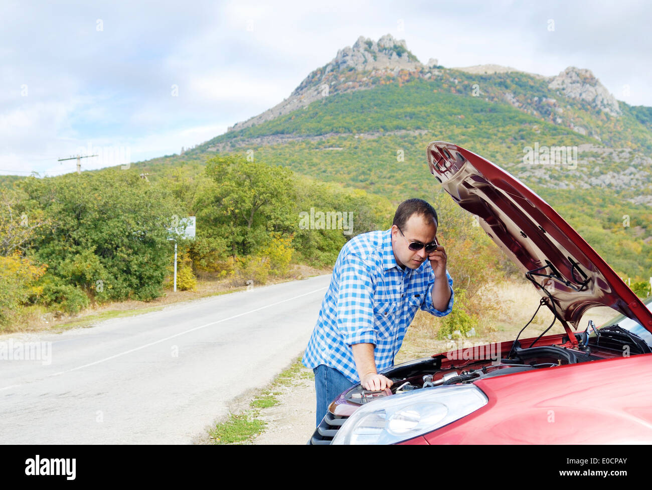 Man standing beside car hi-res stock photography and images - Alamy