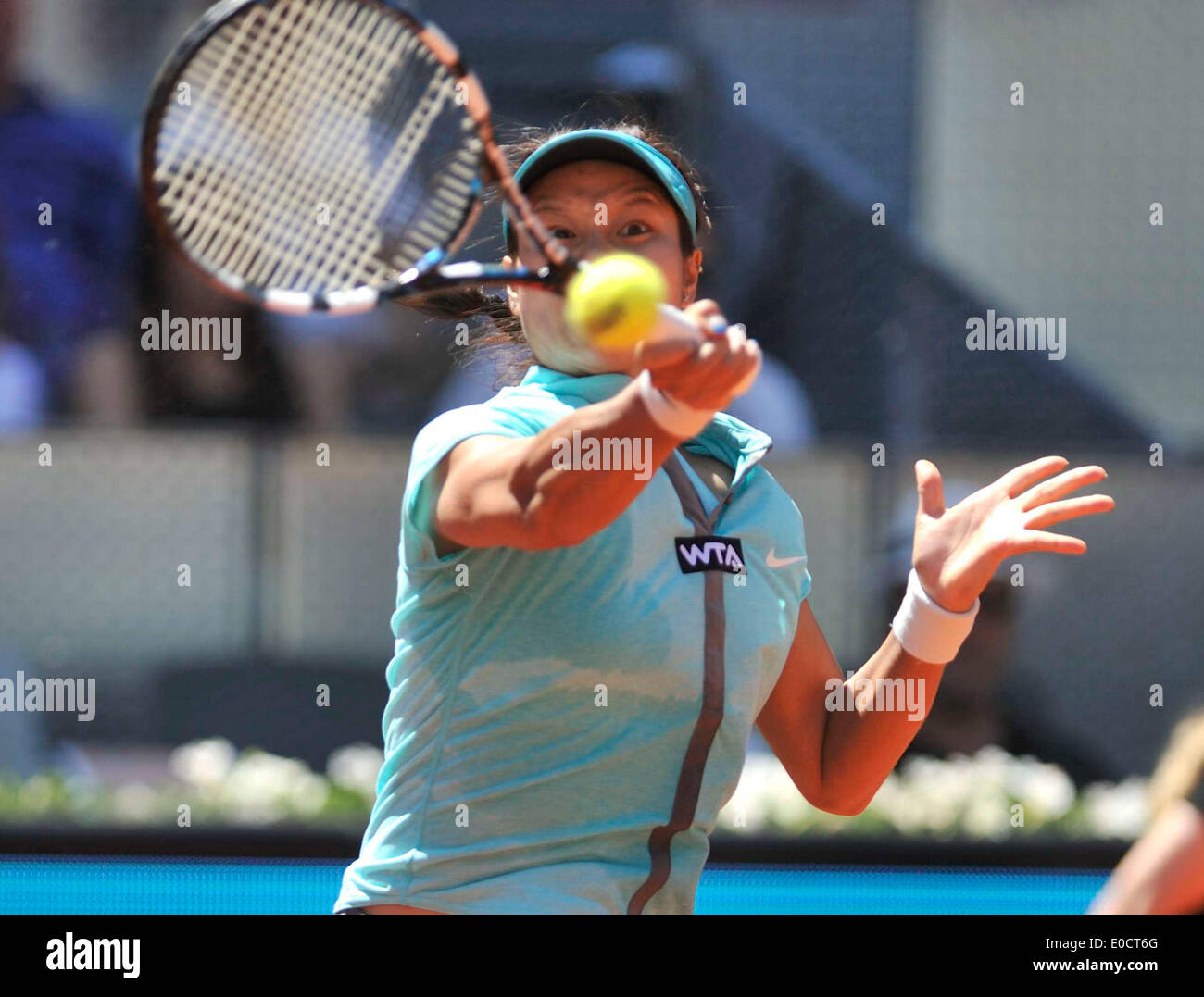 Madrid, Spain. 9th May, 2014. China's Li Na returns a shot to Maria ...