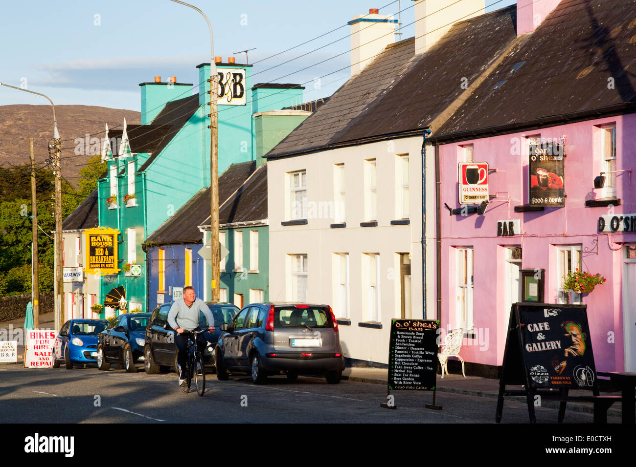 Colourful buildings along a street; Sneem, County Kerry, Ireland Stock ...