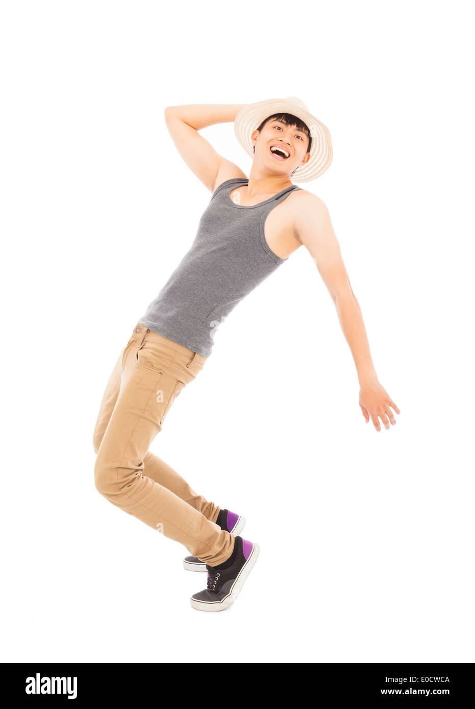 young man imitate dancing pose and holding a hat Stock Photo - Alamy
