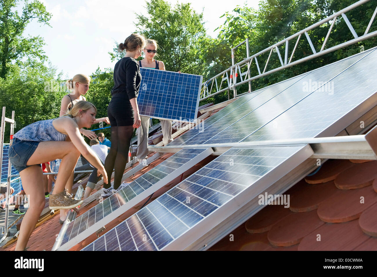 School project, students installing a solar plant, Freiburg im Breisgau ...