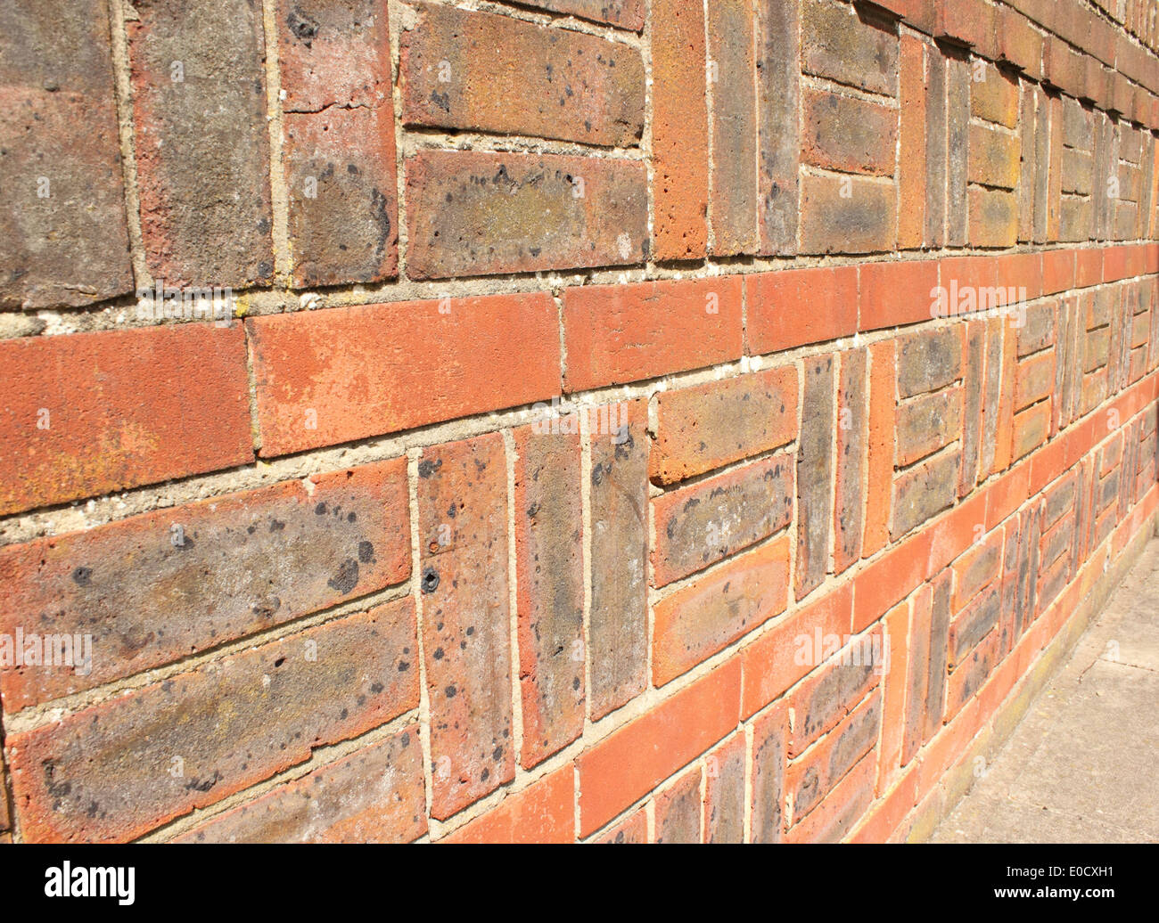 A square patterned wall built with good quality red bricks Stock Photo ...