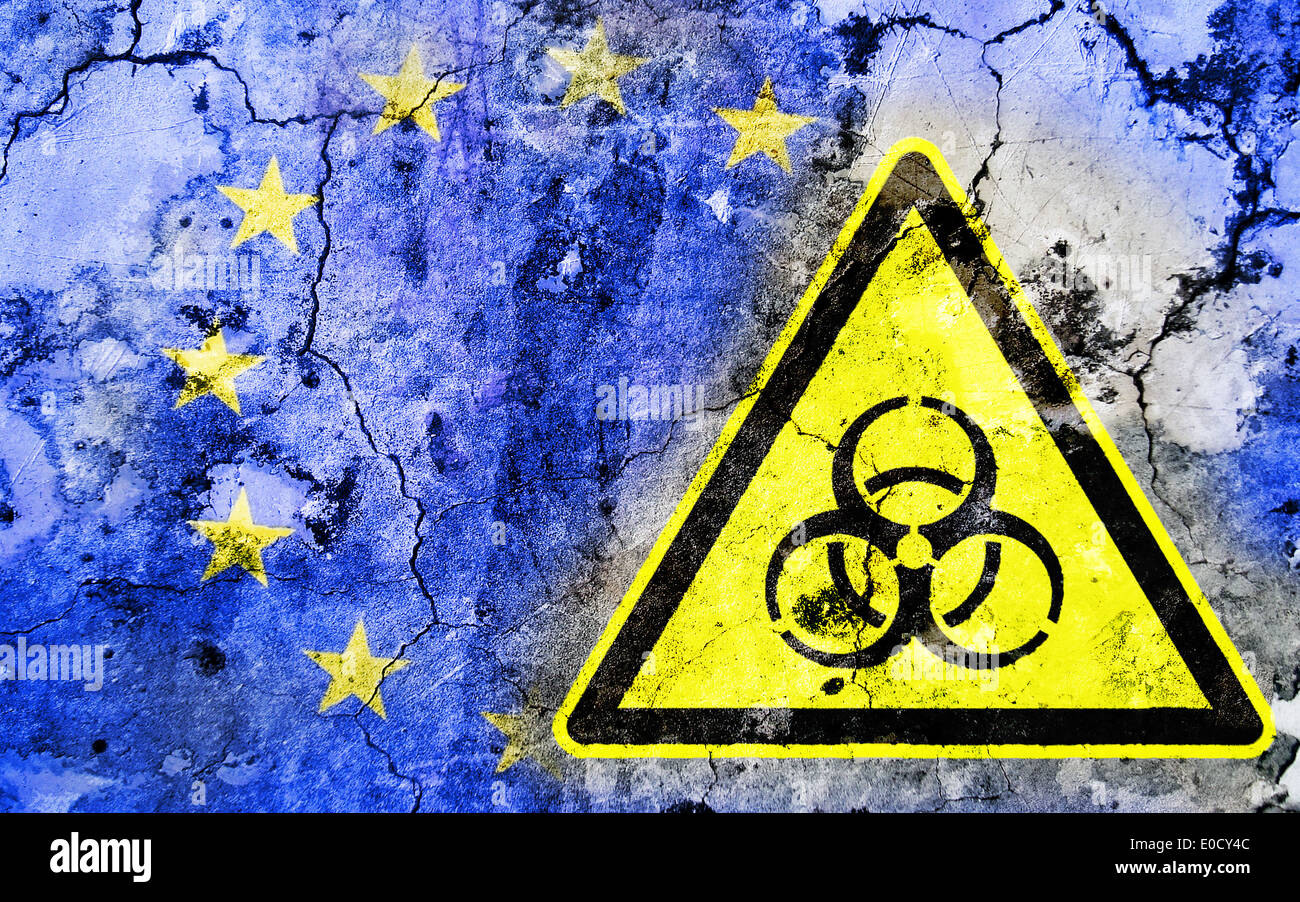 Old cracked wall with biohazard warning sign and painted flag flag of ...