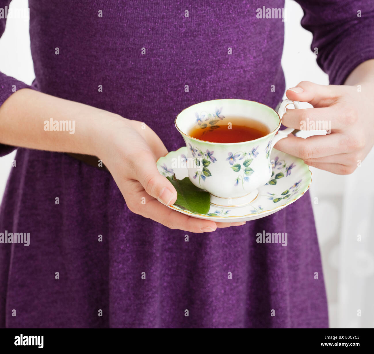 Girl pouring tea hi-res stock photography and images - Alamy