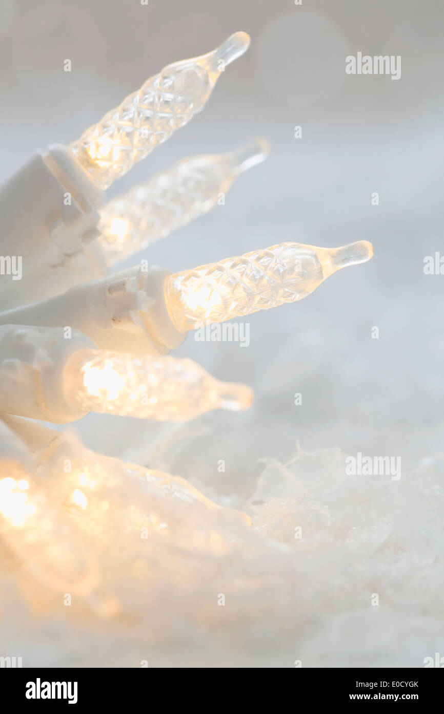 Christmas lights on snow Stock Photo - Alamy