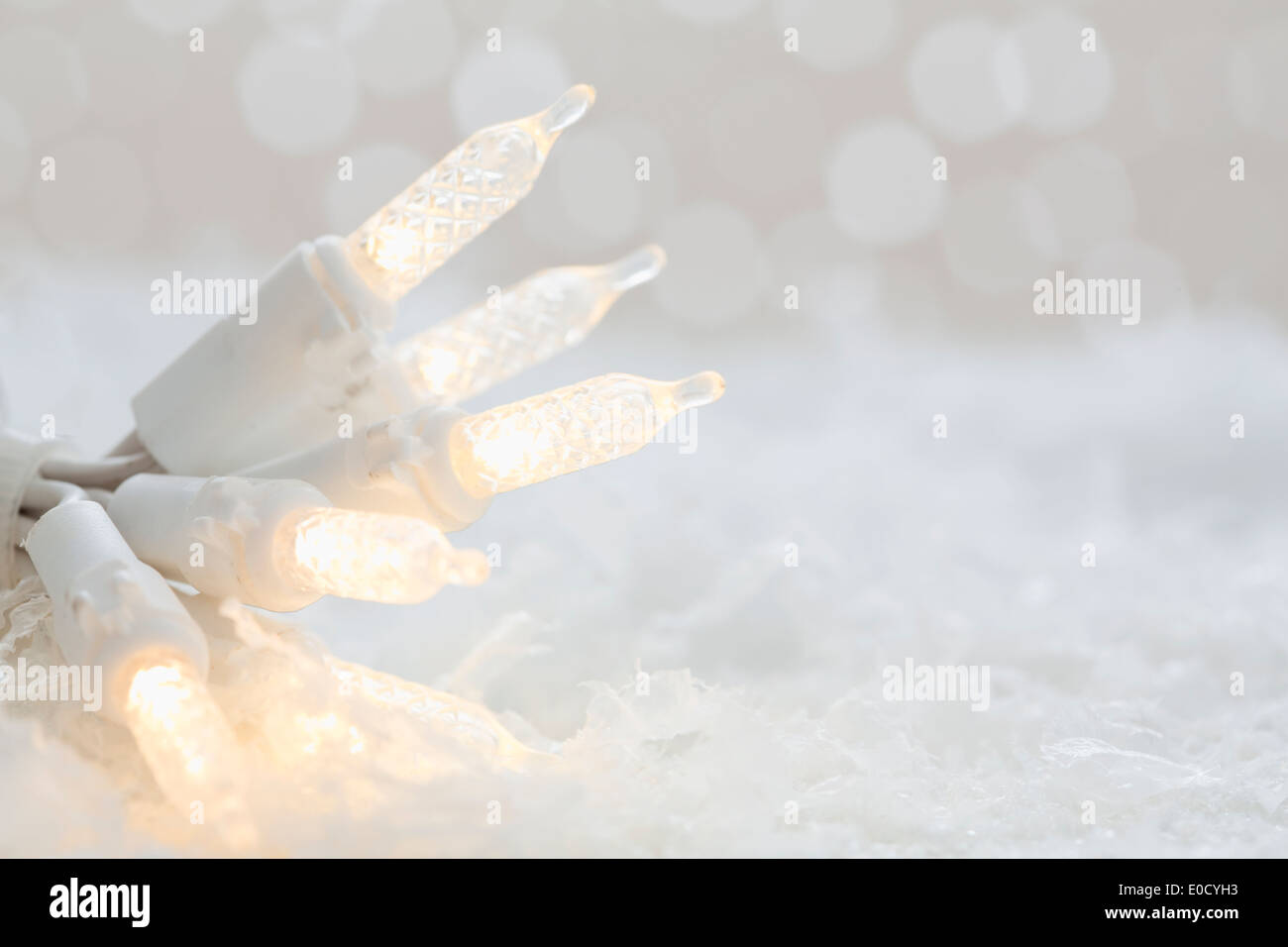 Christmas lights on snow Stock Photo - Alamy
