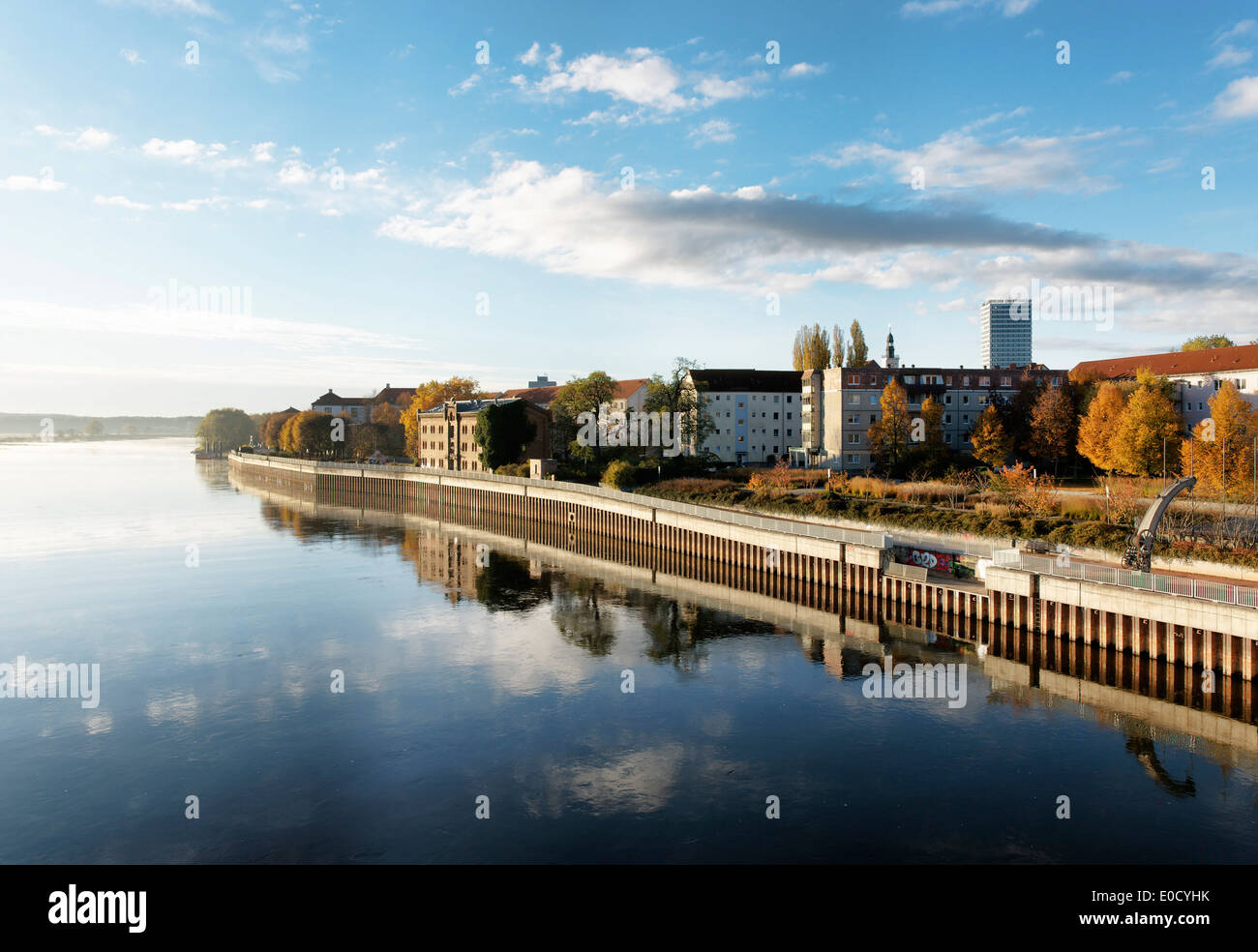 Oder river, houses and Oder Tower under clouded sky, Frankfurt/Oder ...