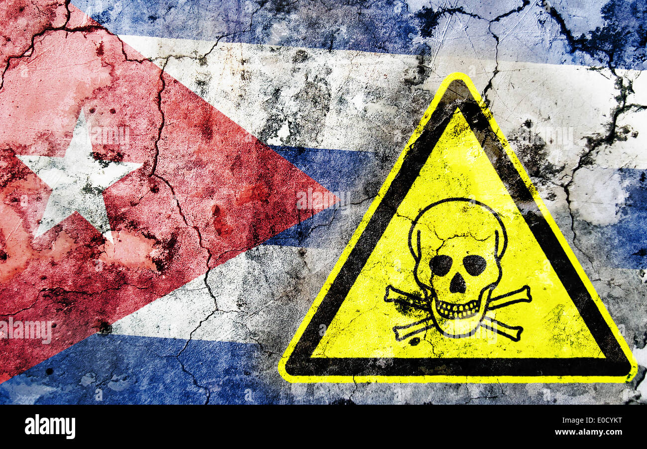 Old cracked wall with poison warning sign and painted flag flag of Cuba ...