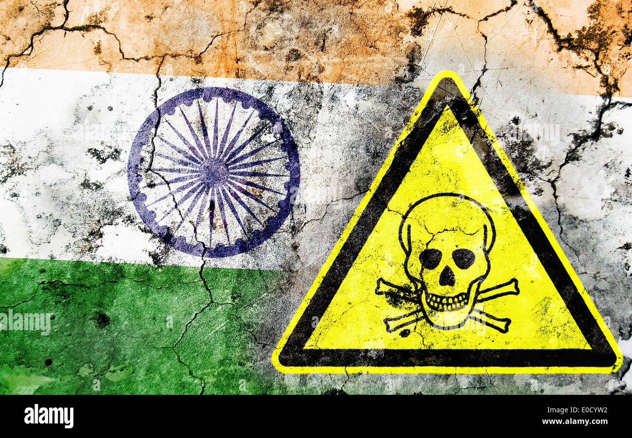 Old cracked wall with poison warning sign and painted flag flag of ...