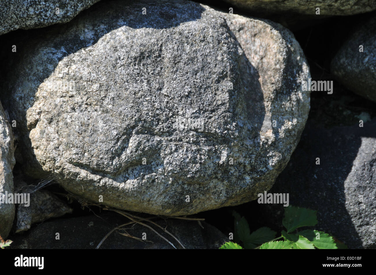 Rocks with faces Stock Photo - Alamy