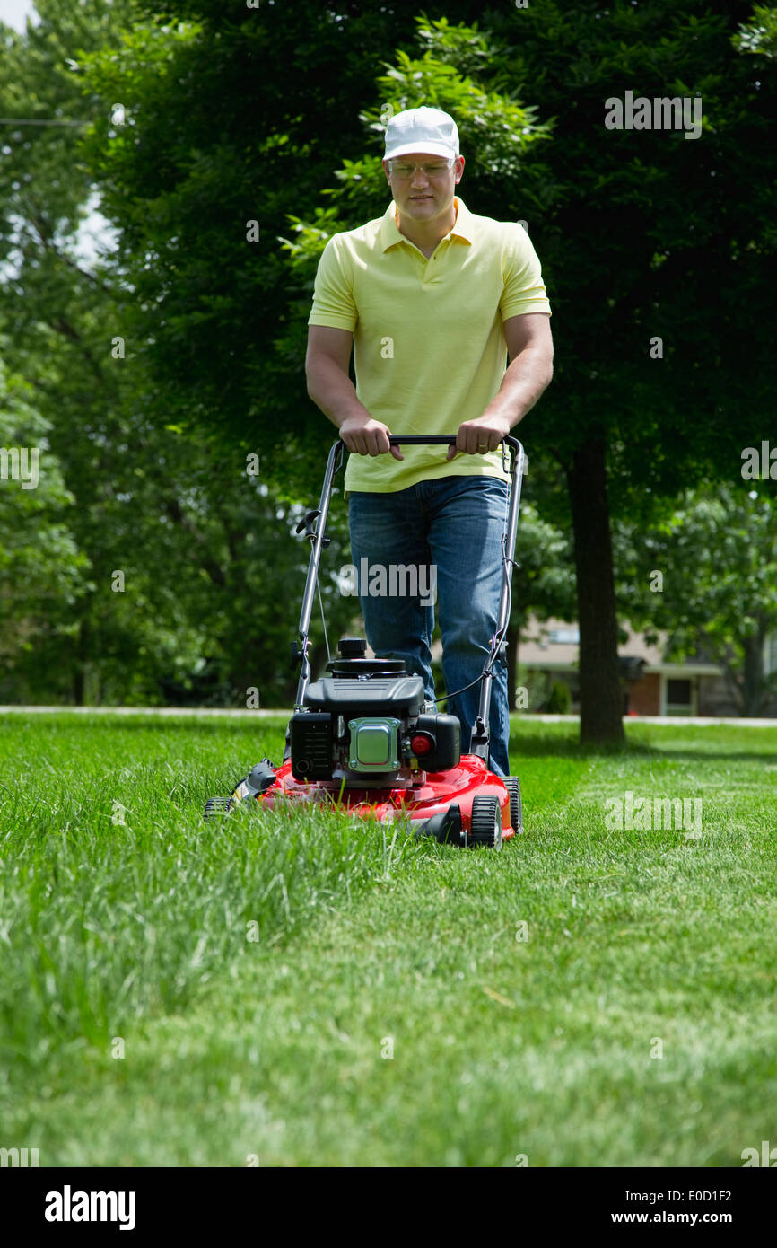 Lawn mowing gardener mower hi-res stock photography and images - Alamy