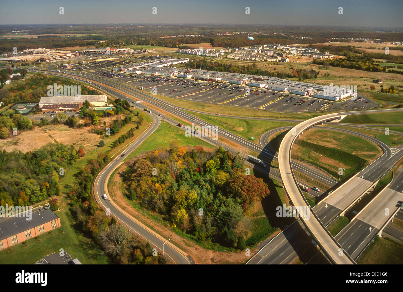 LOUDOUN COUNTY, VIRGINIA, USA - Aerial of highway flyover and shopping ...