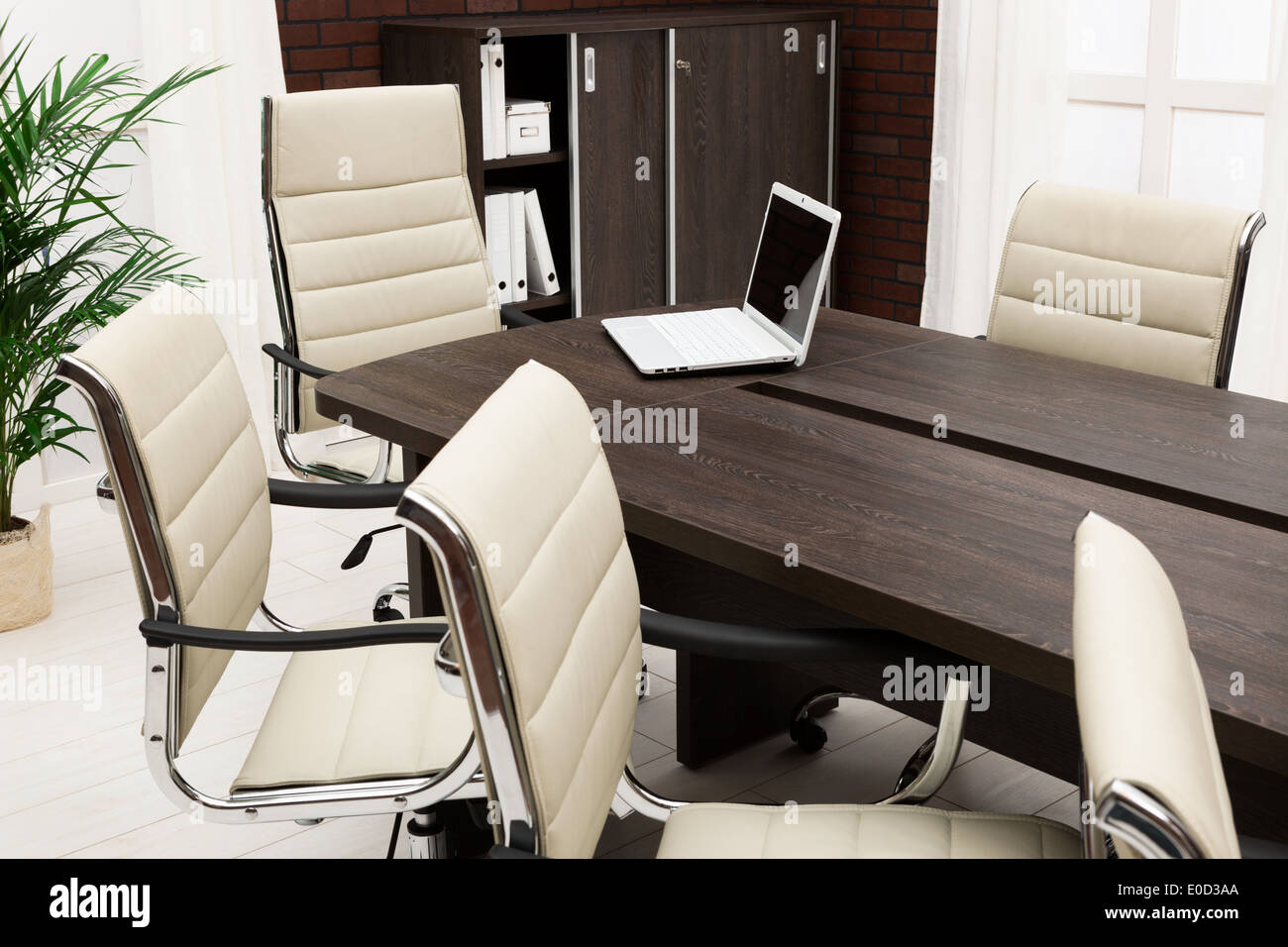 laptop on a desk in a modern office Stock Photo - Alamy