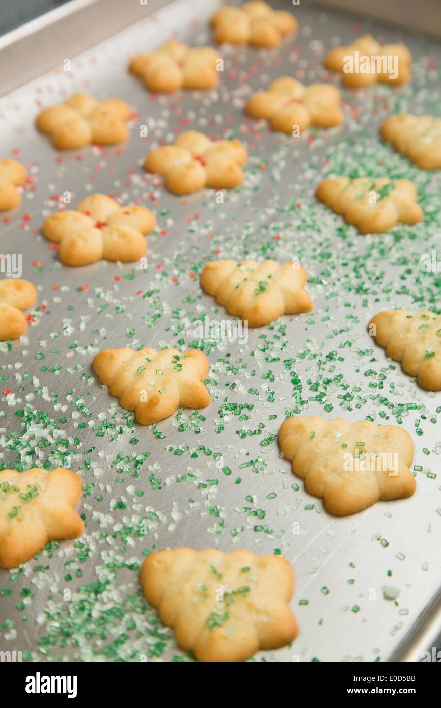 Baked spritz cookies on baking sheet Stock Photo - Alamy