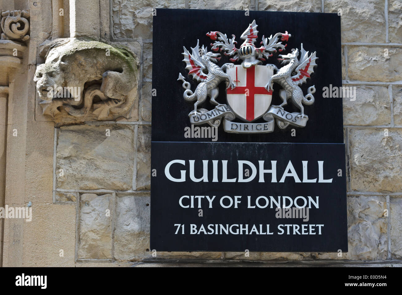 A banner bearing a Code of Arms of Guildhall at the Entrance of the ...