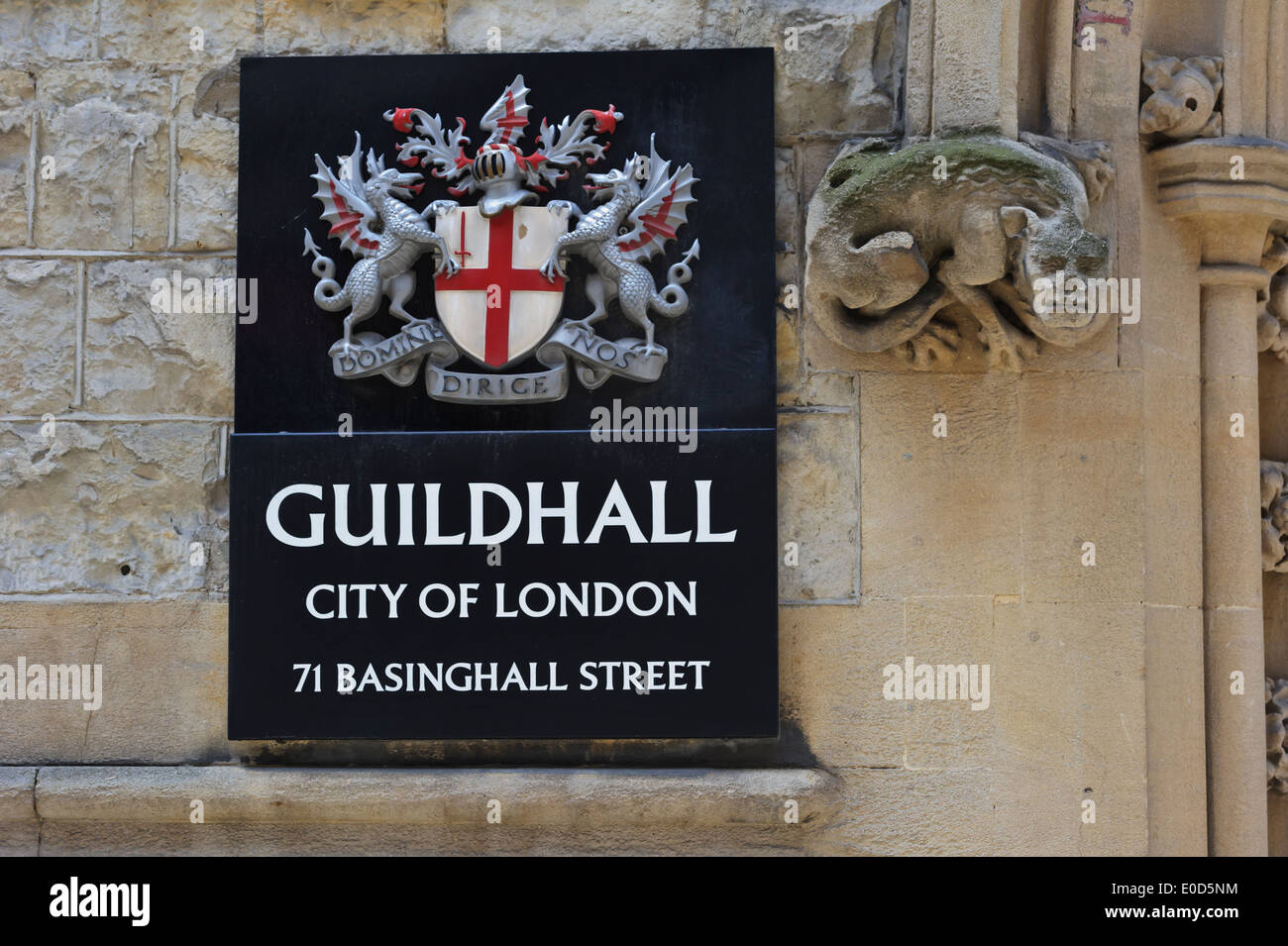 A banner bearing a Code of Arms of Guildhall at the Entrance of the ...