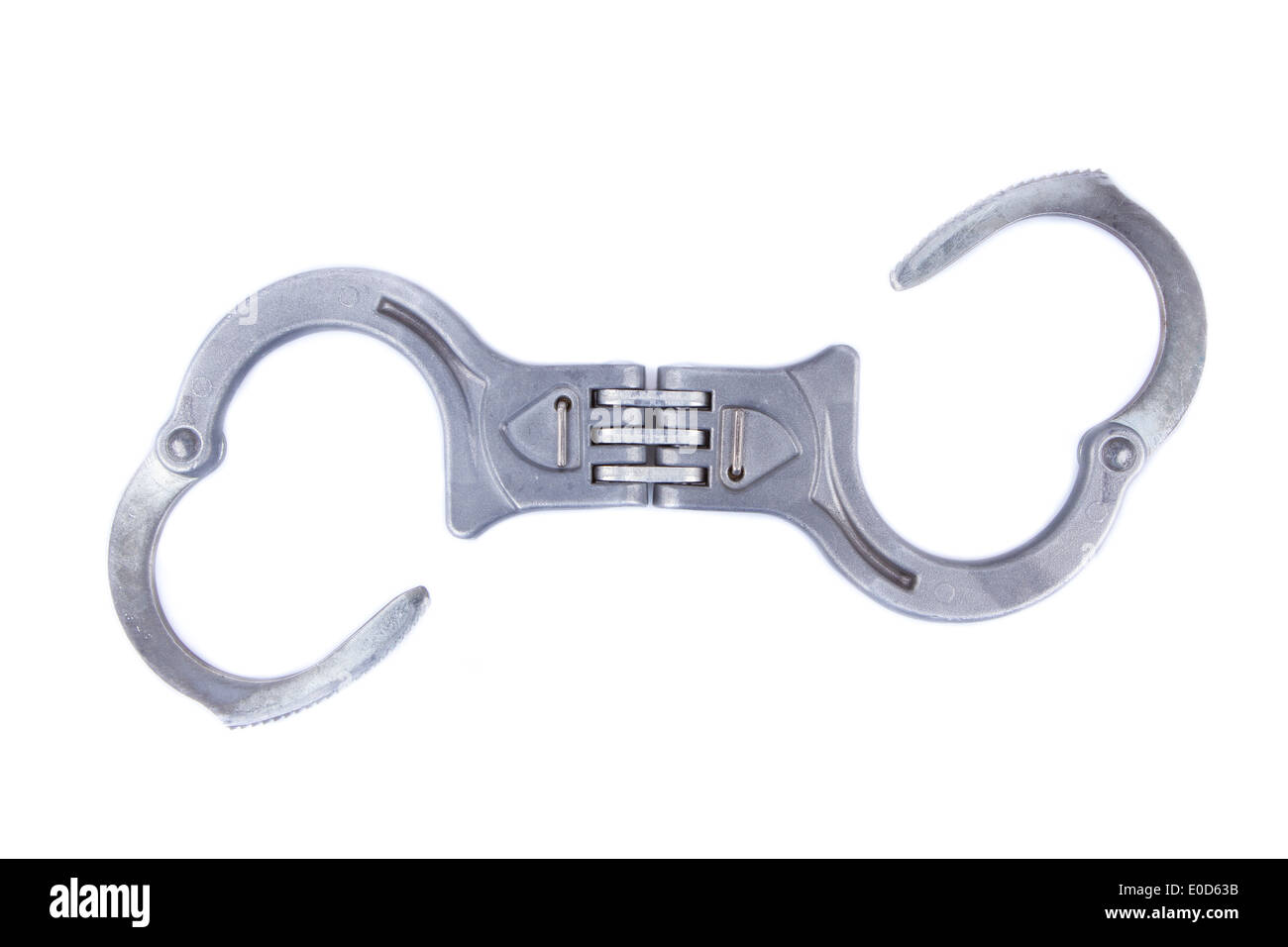 Metal handcuffs isolated on a white background Stock Photo - Alamy