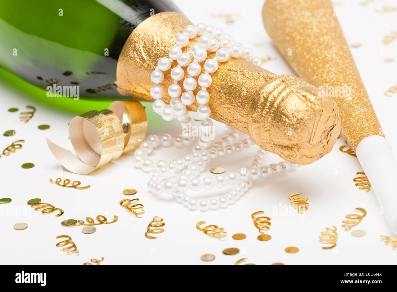 Champagne bottle with pearls Stock Photo - Alamy
