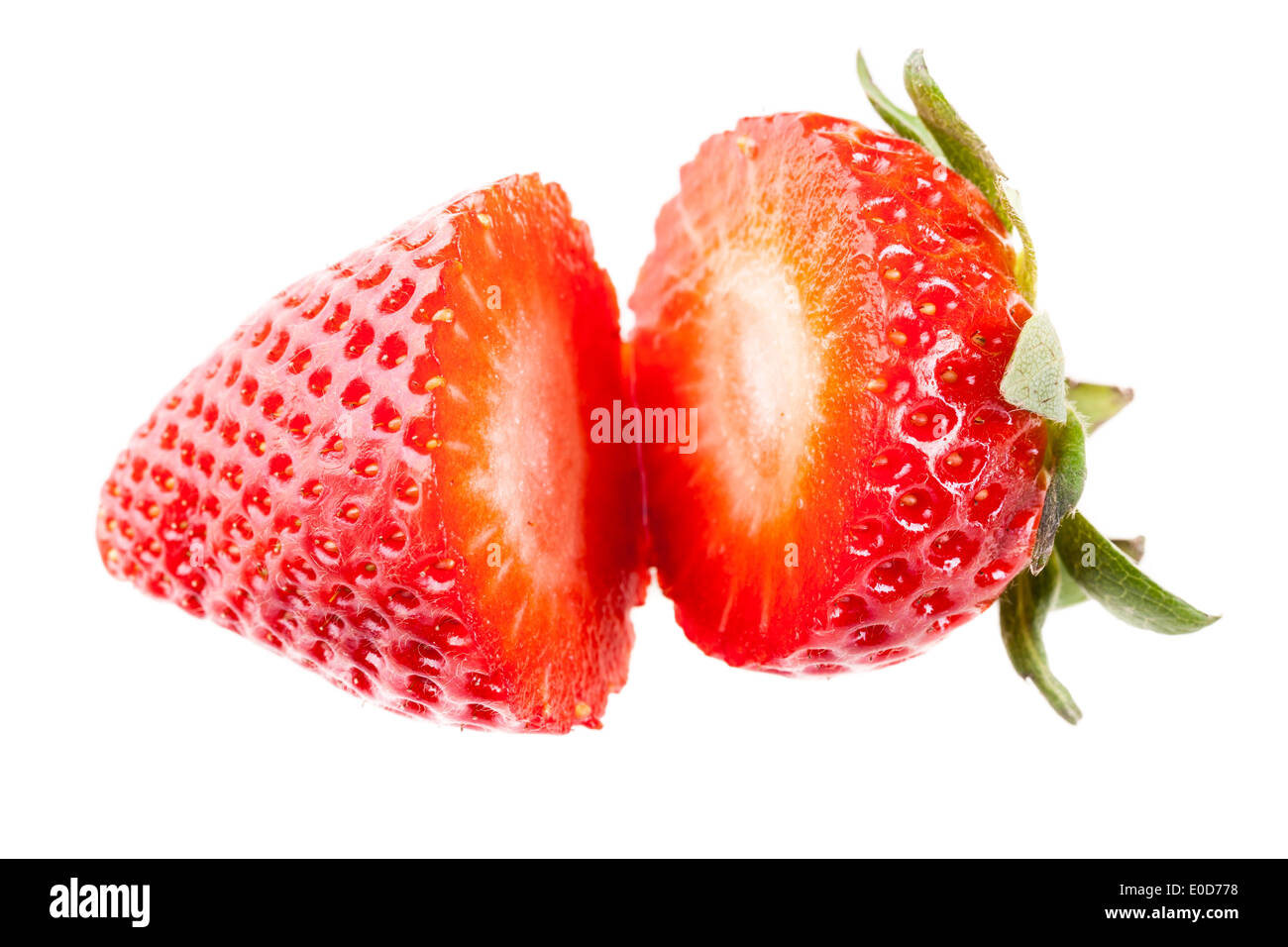 a ripe strawberry cutted in half isolated over a white bachground Stock ...
