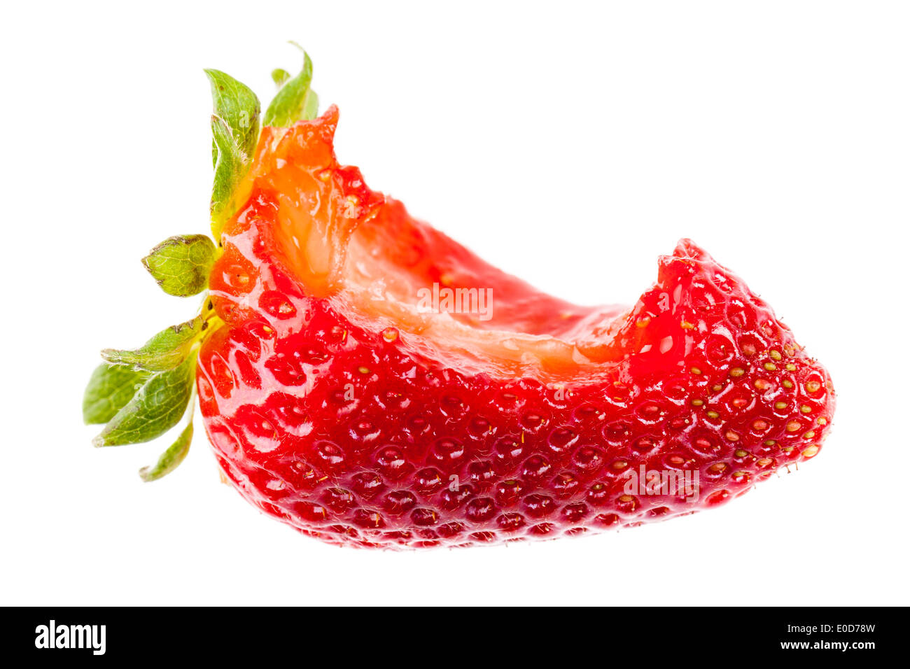 a ripe strawberry with a bite mark isolated over a white bachground ...