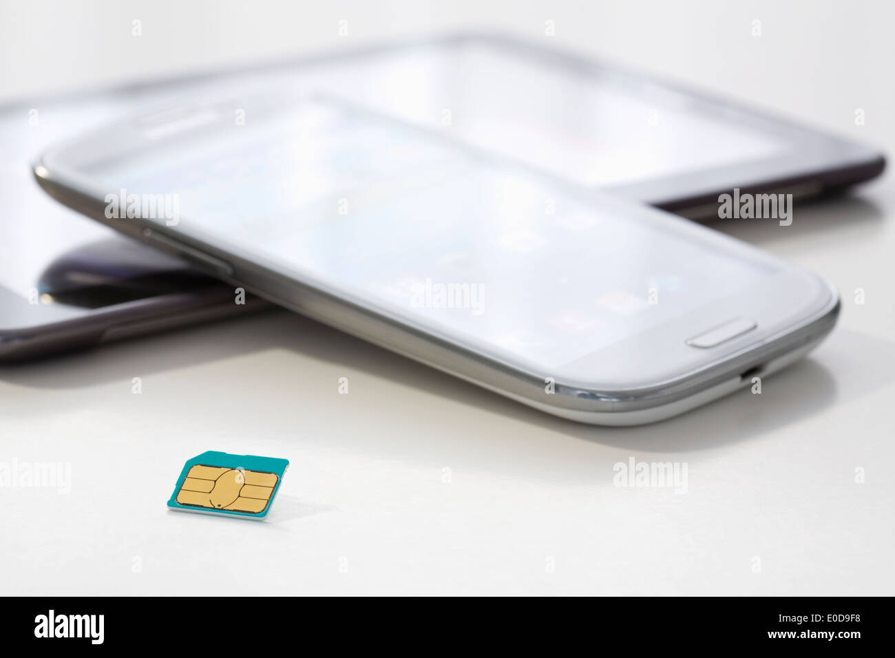 Cell phone and tablet pc with sim card Stock Photo - Alamy