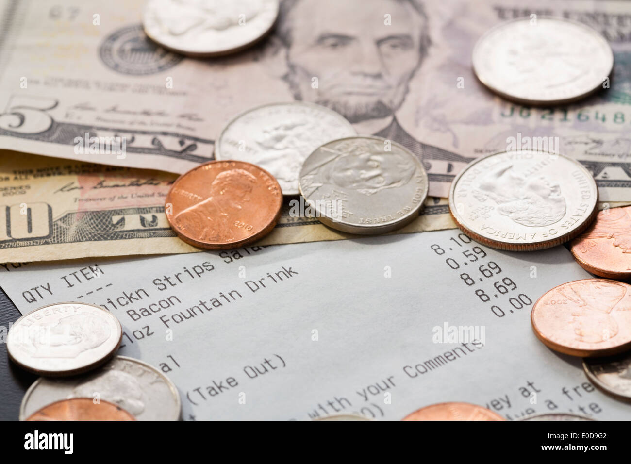 Restaurant receipt and money Stock Photo - Alamy