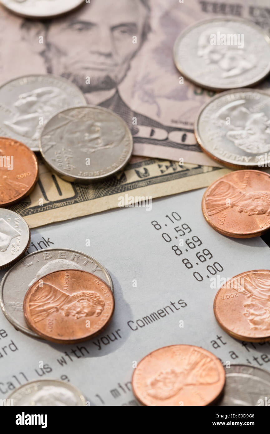Restaurant receipt and money Stock Photo - Alamy
