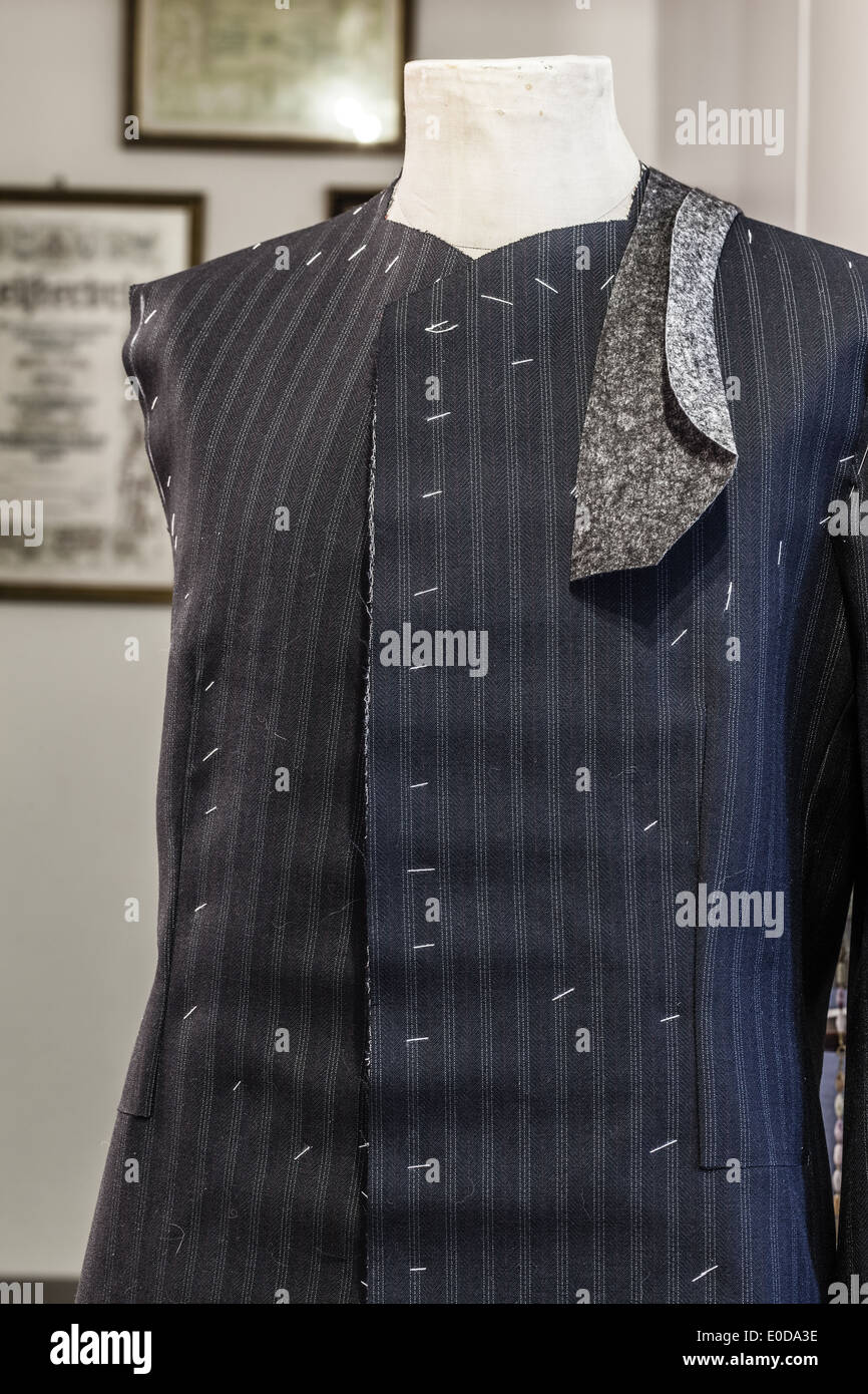 detail of an unfinished suit in a tailor shop Stock Photo - Alamy