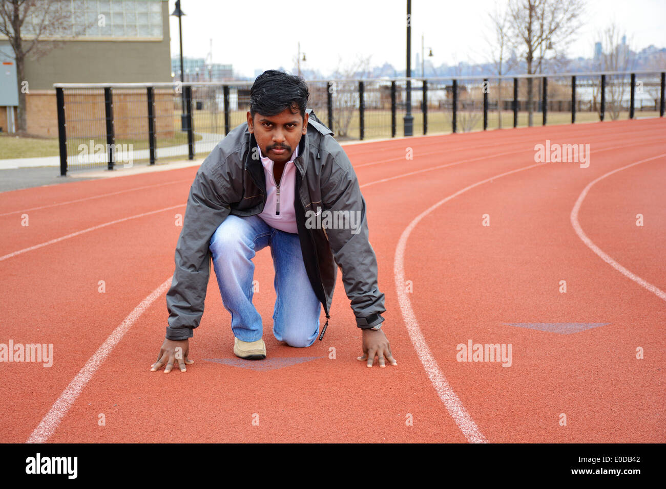 Man on track Stock Photo - Alamy