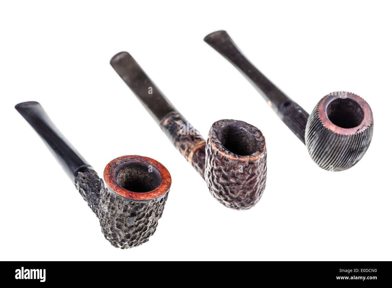 three rustic tobacco pipes isolated over a white background Stock Photo ...