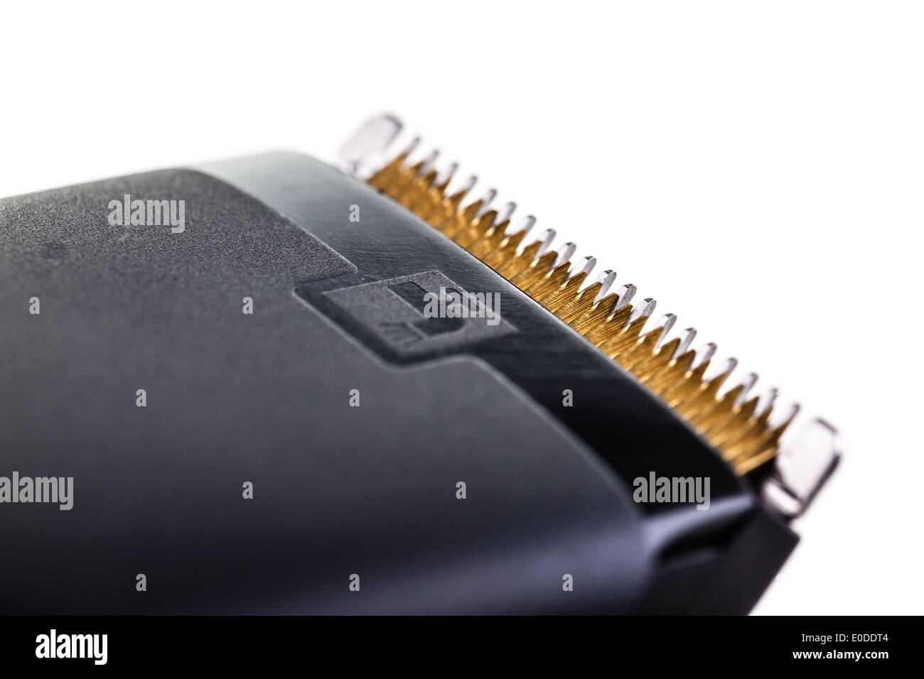 macro shot of a hair clipper head isolated over a white background ...