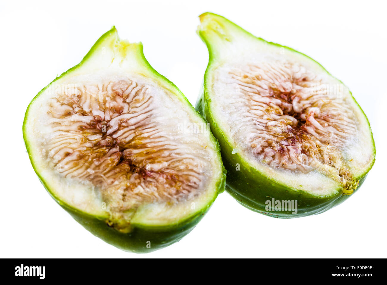 ripe green figs isolated over a white background Stock Photo - Alamy