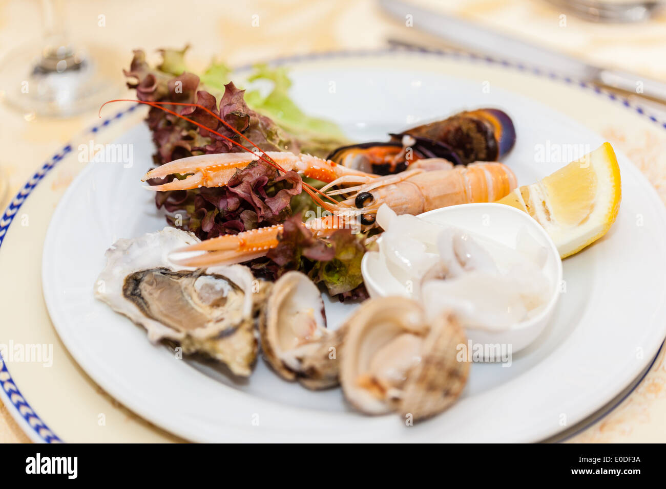 a seafood dish in a restaurant with prawn and shellfish Stock Photo - Alamy