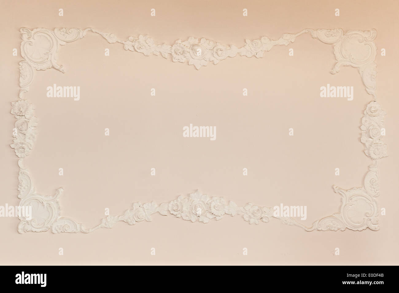 a plaster frame on an interior wall with friezes Stock Photo - Alamy