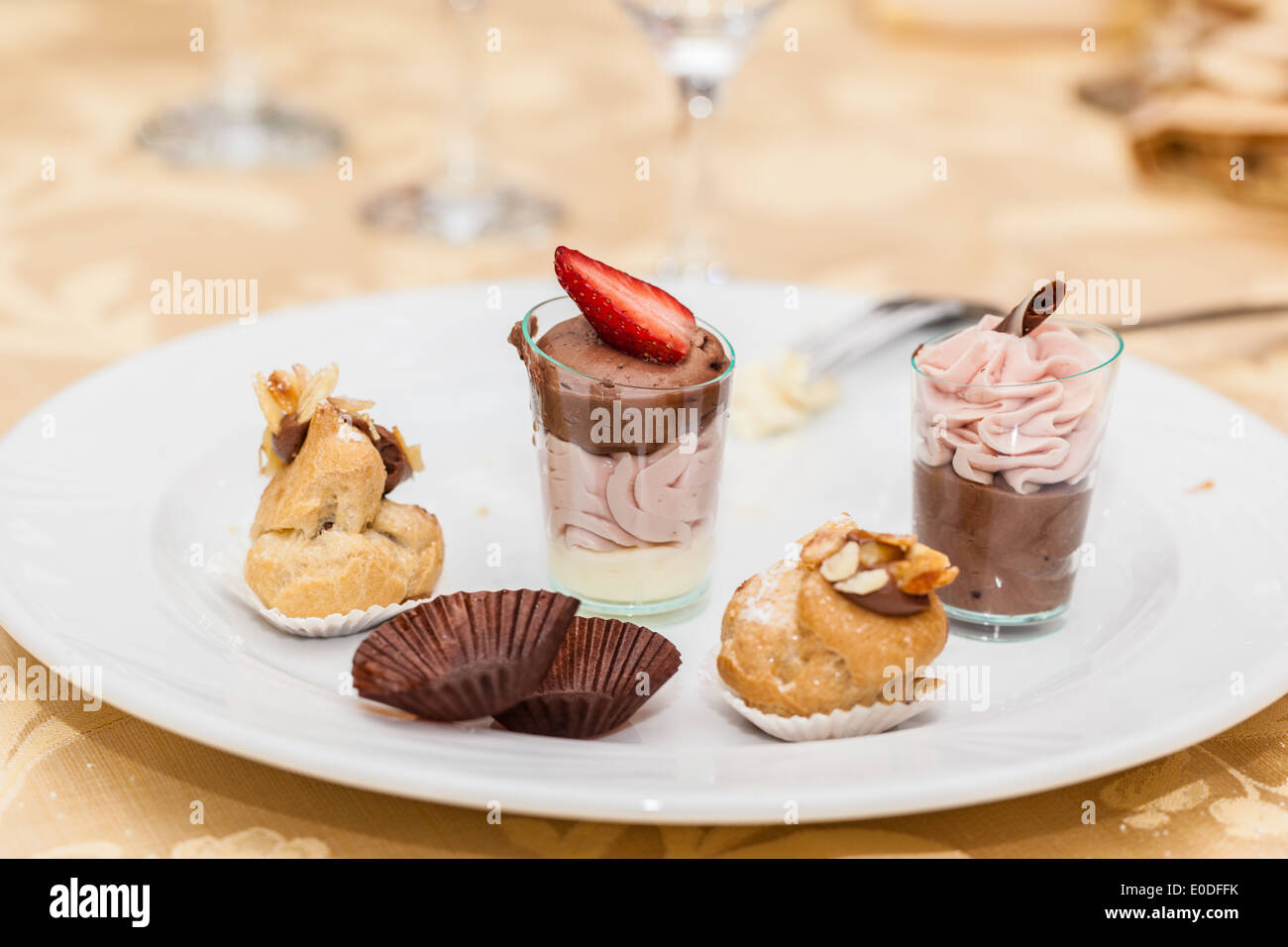 delicious assorted pastries in a plate on a restaurant table Stock ...