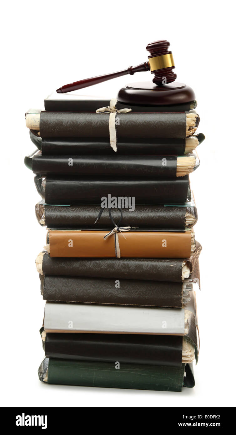 Stack of old paper folders and gavel Stock Photo - Alamy
