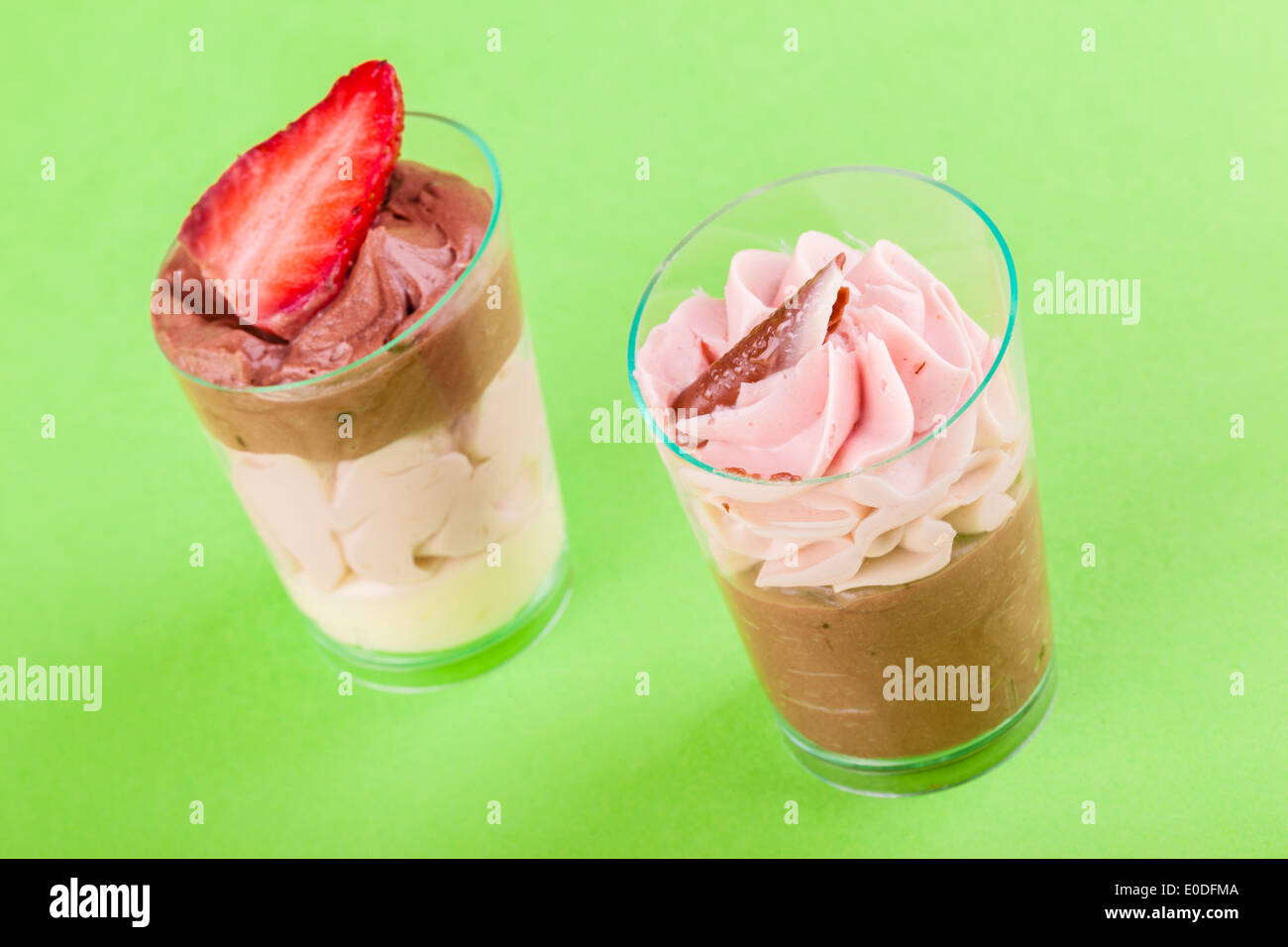 delicious ice cream shots with whirls and topping Stock Photo - Alamy