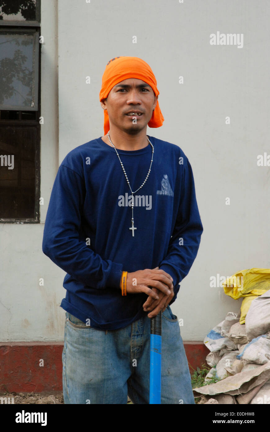 Filipino laborers resting from work at building site, Manila ...