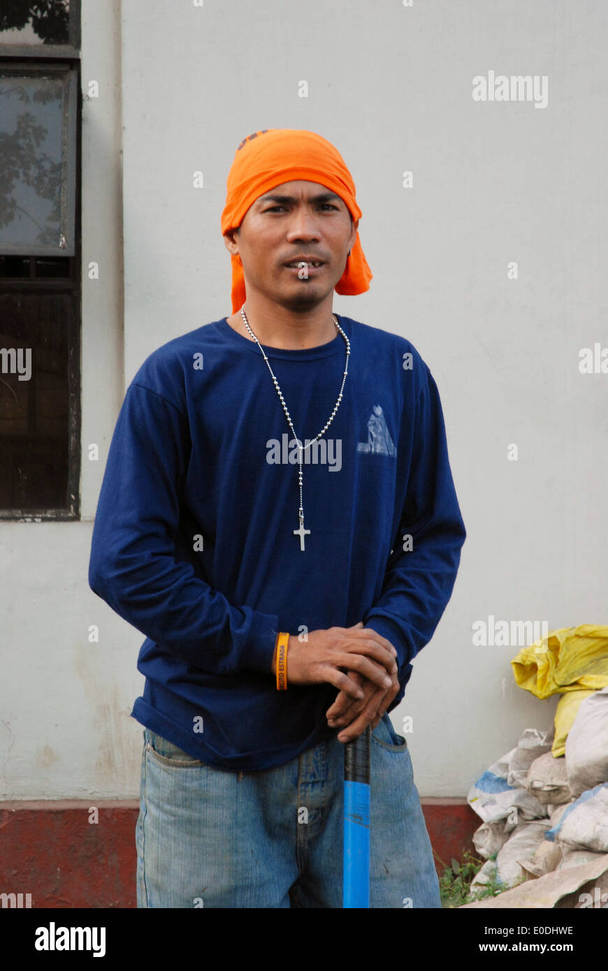 Filipino laborers resting from work at building site, Manila ...