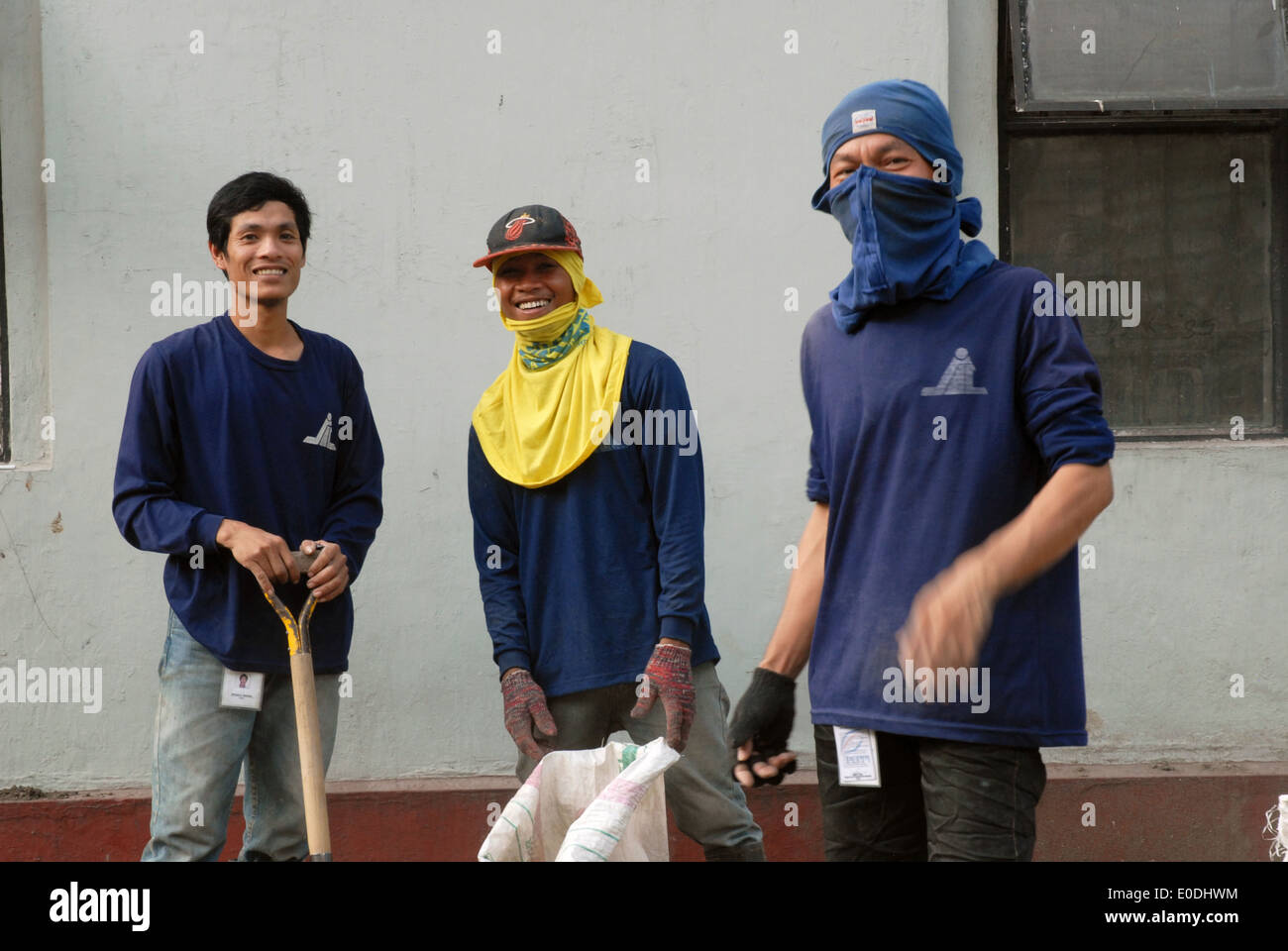 Filipino laborers resting from work at building site, Manila ...